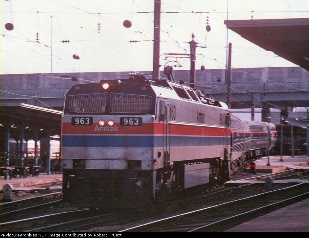 AMTK 963 with one of the corridor trains leaving the upper level of Union Station